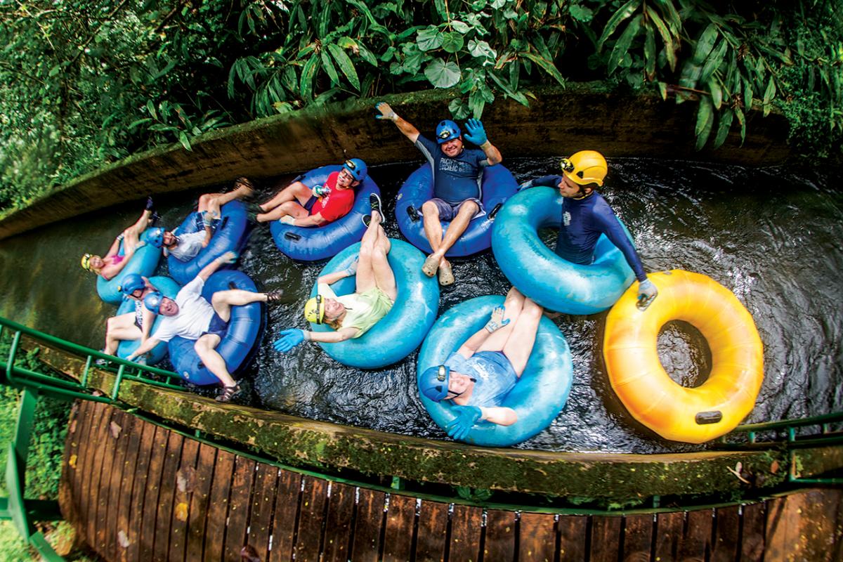 Float down flumes on Kauai Backcountry Adventures' mountain-tubing tour ...